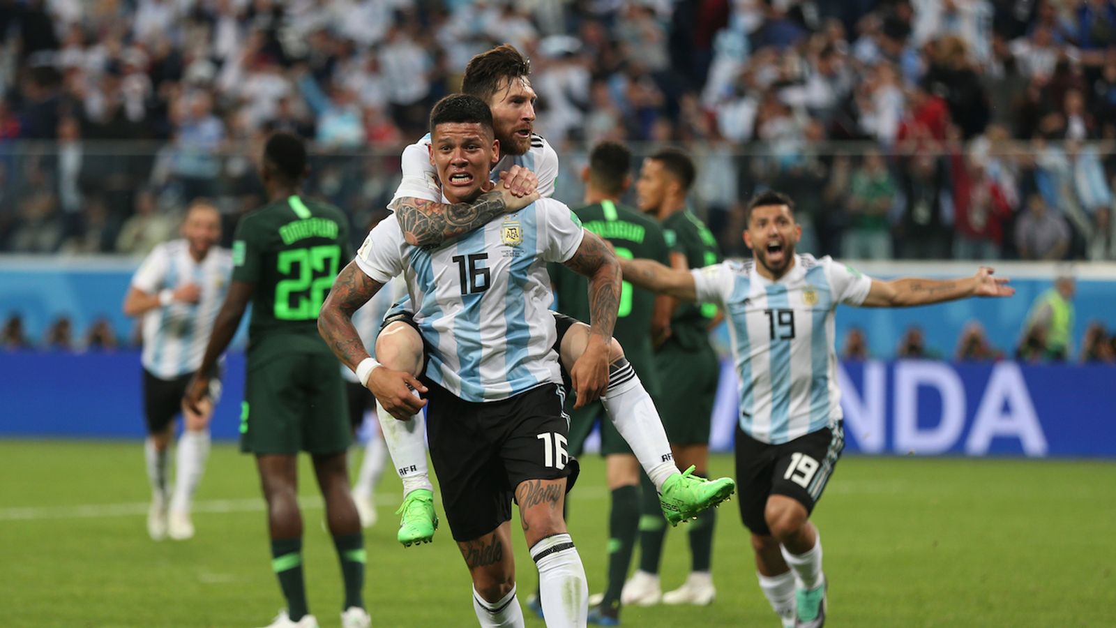 World Cup Day 13: Messi, Rojo lead Argentina through